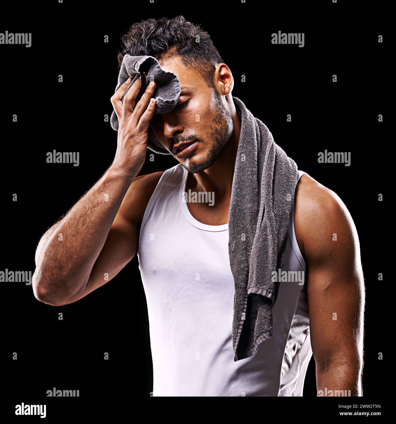 Fitness, sweat and man on black background with towel for exercise ...