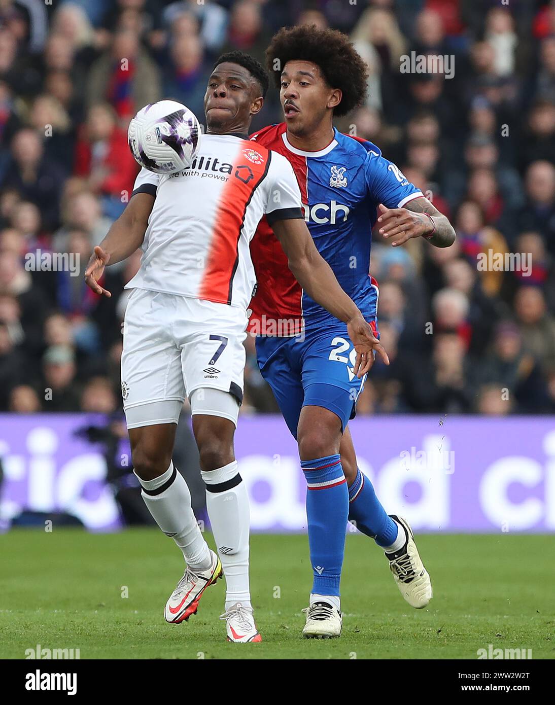 Chiedozie Ogbene of Luton Town battles Chris Richards of Crystal Palace ...