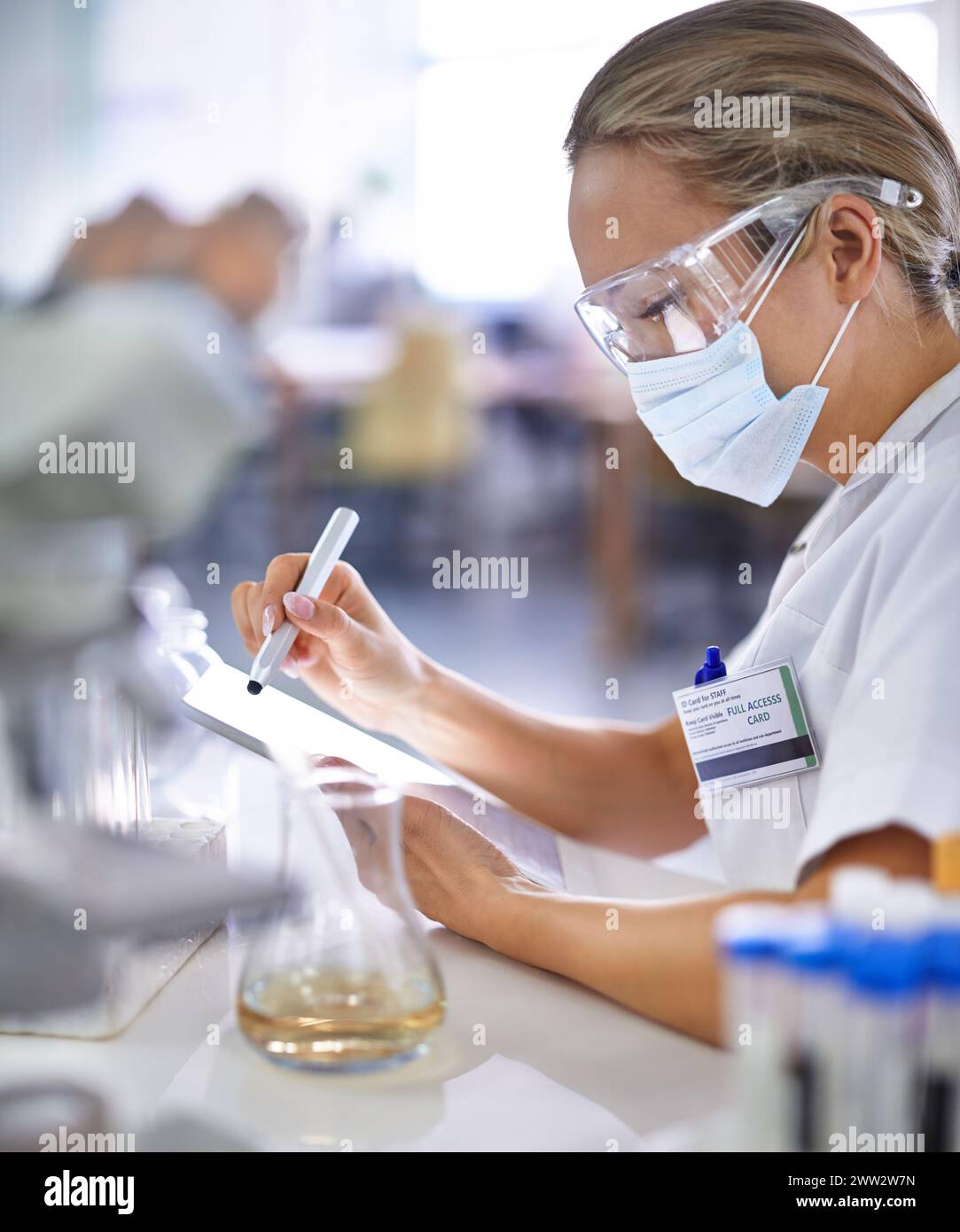 Female scientist laboratory worker checklist hi-res stock photography ...