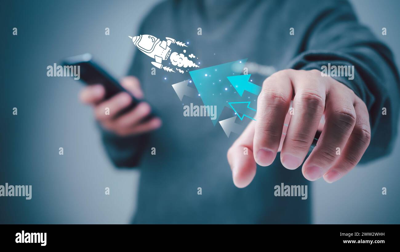 Start up business concept to success, Man holding smartphone and white ...