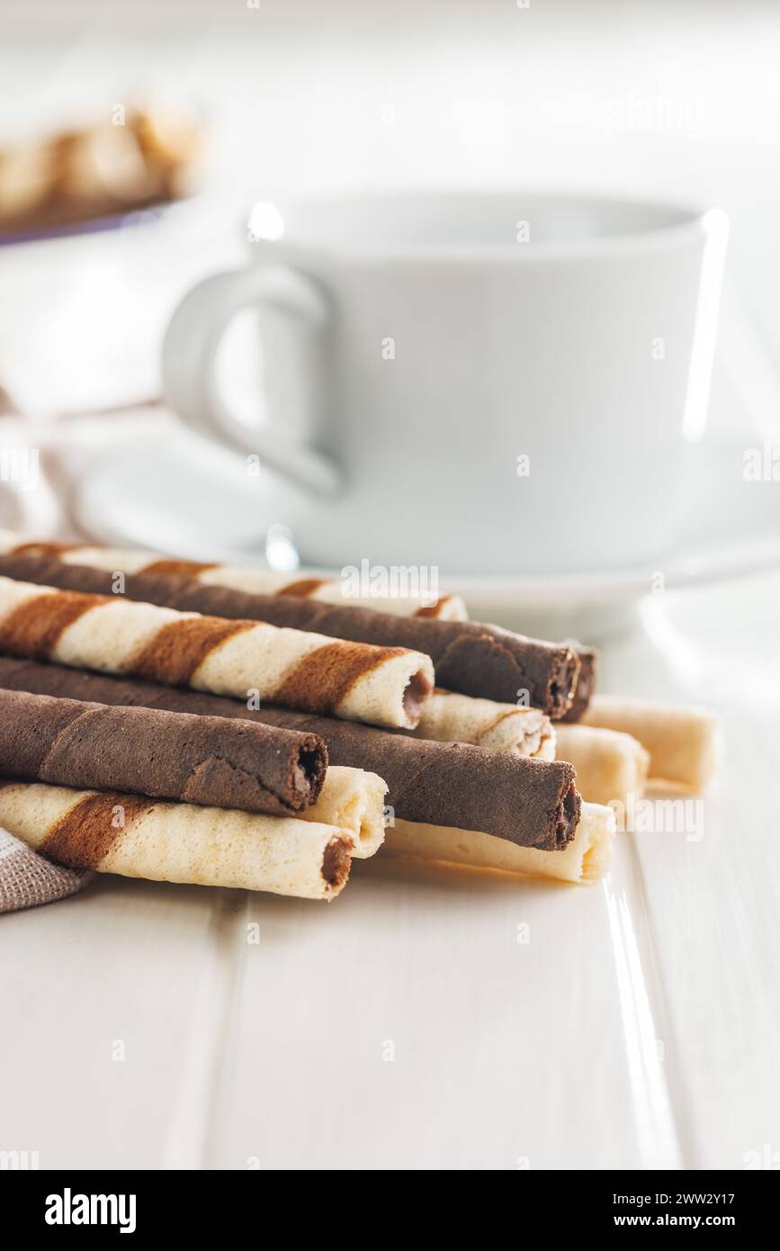 Assorted Chocolate and Vanilla Cream Filled Wafer rolls on a white ...
