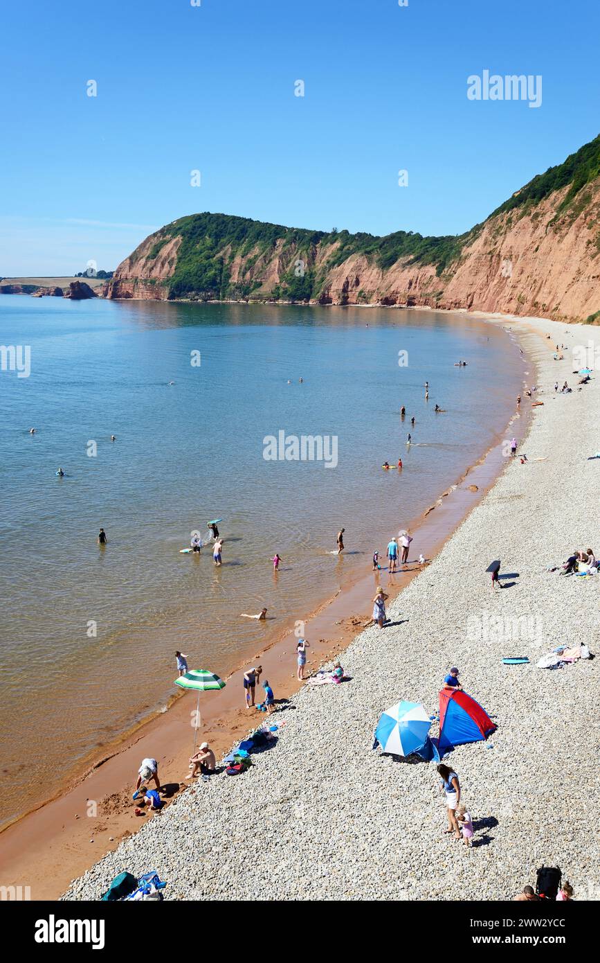 Elevated view of tourists relaxing on Jacobs Ladder beach with cliffs ...