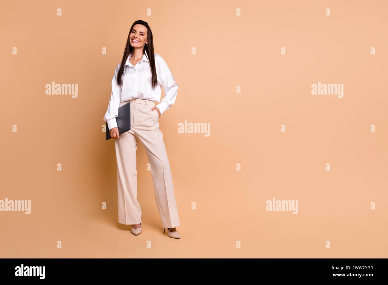 Full length photo of stunning classy executive director hold laptop ...