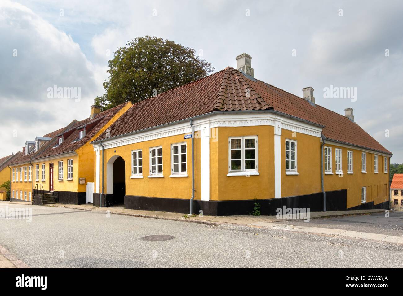 Street scene of Søndergade in downtown Hobro with yellow houses ...