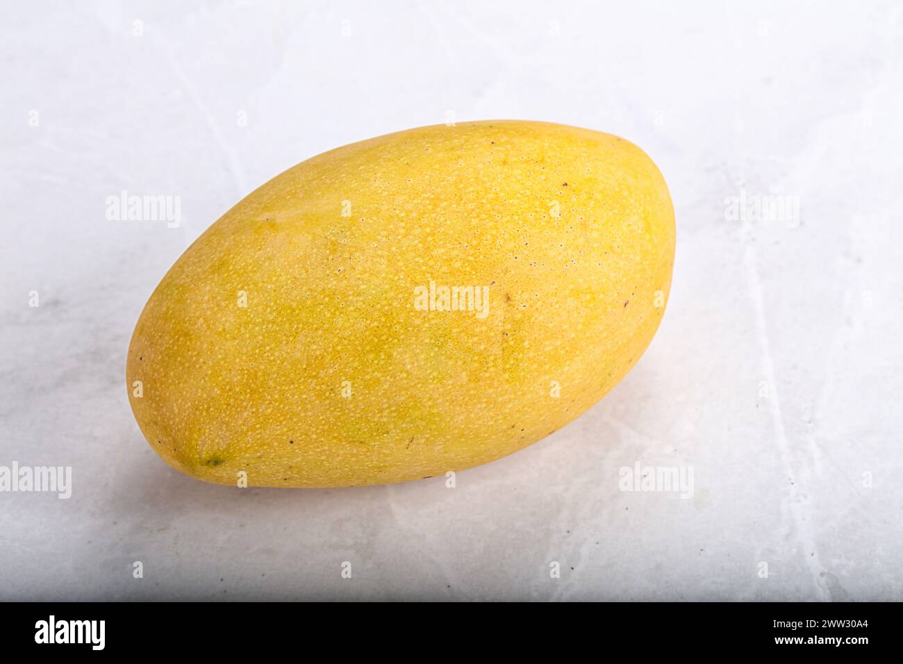 Sweet ripe juicy tropical yellow mango fruit Stock Photo - Alamy