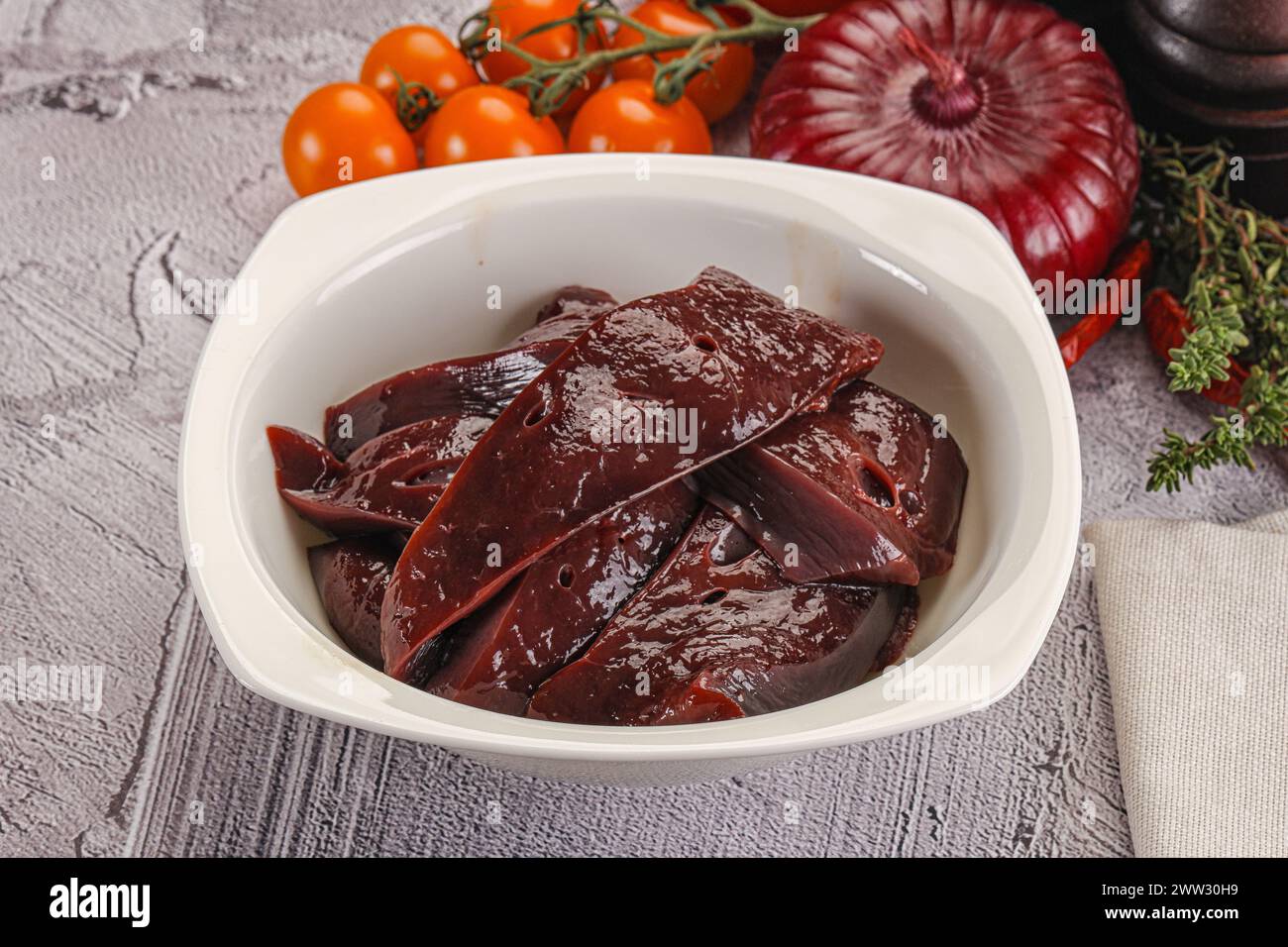 Raw dietary beef liver slices for cooking Stock Photo - Alamy