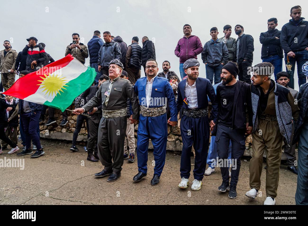 Akre, Iraq. 20th Mar, 2024. Iraqi Kurds dance as they celebrate Nowruz ...