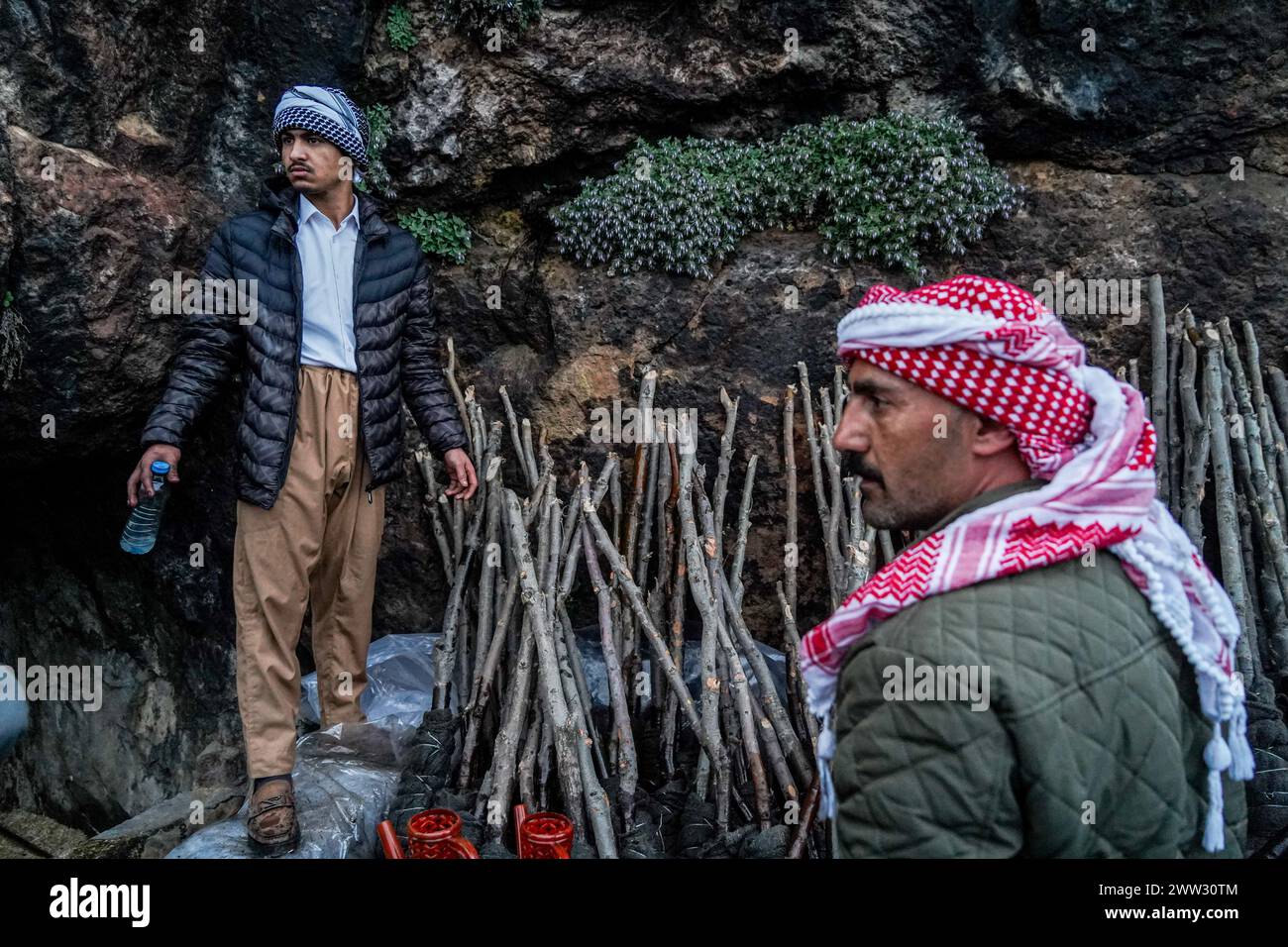 Akre, Iraq. 20th Mar, 2024. Iraqi Kurds prepare fire torches as they ...