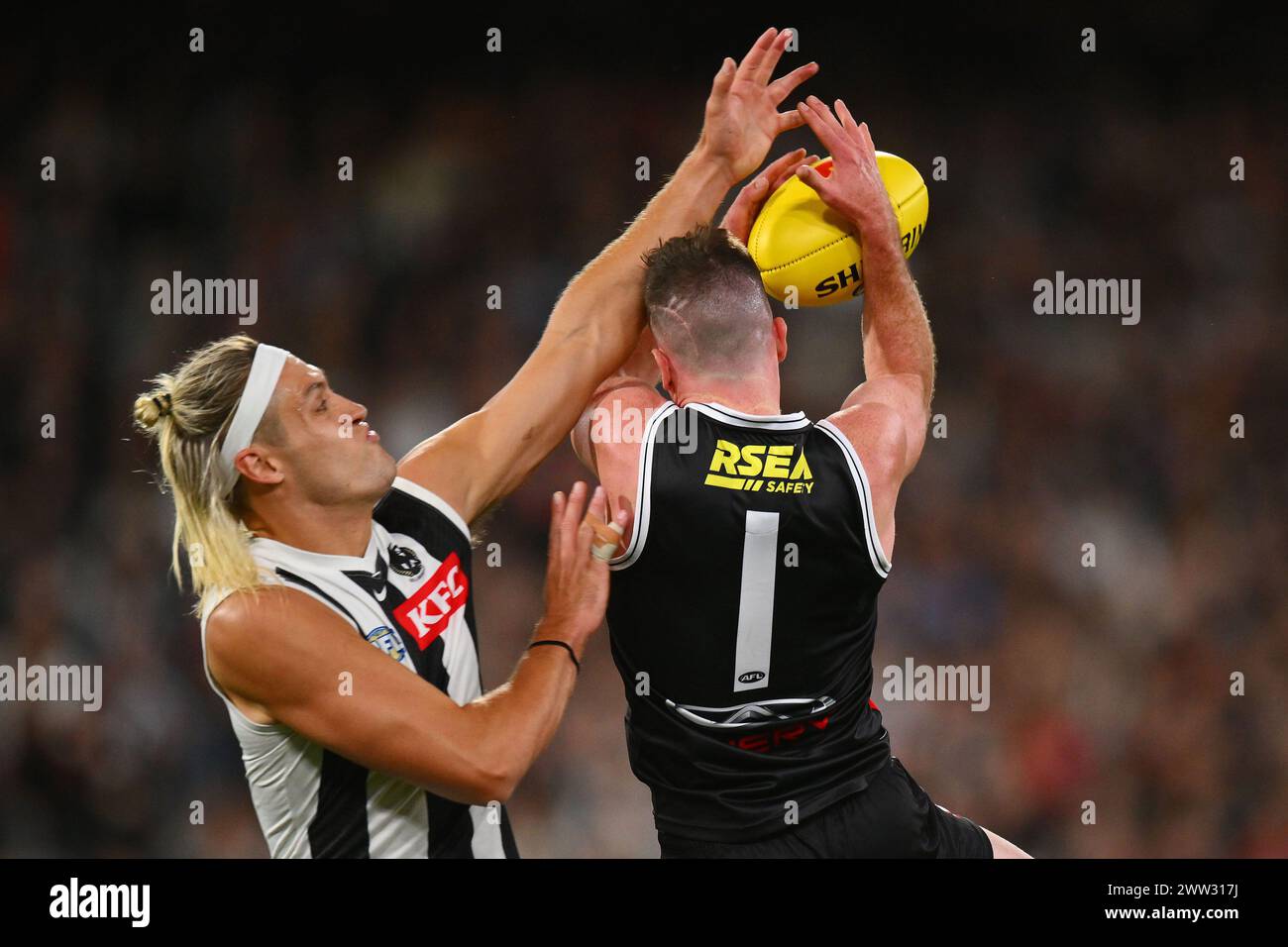 Melbourne, Australia. 21st Mar, 2024. Darcy Moore of the Magpies makes ...