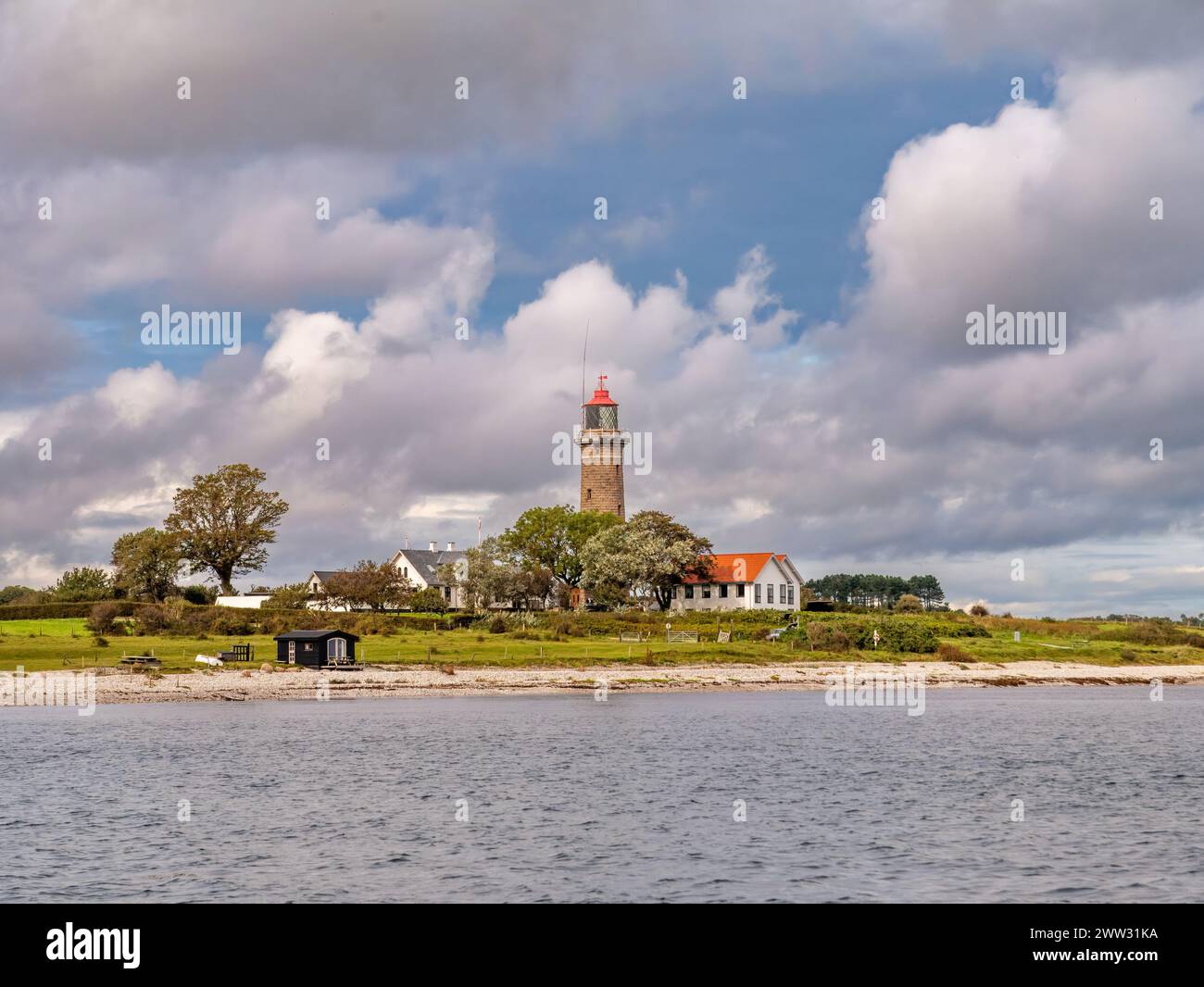 Granite tower of Fornaes lighthouse along the coast of Kattegat ...
