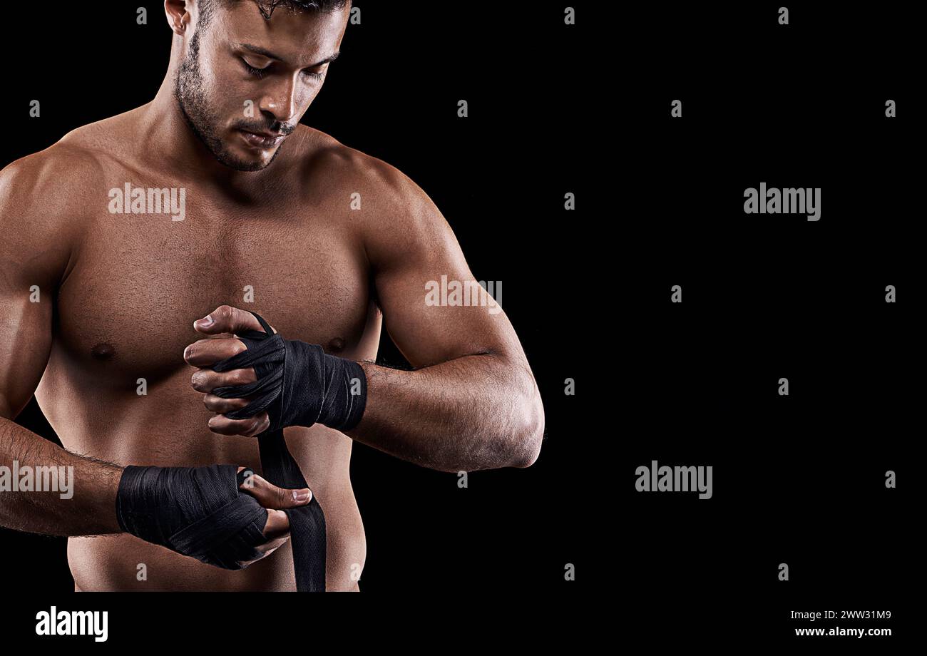 Boxing, man and hand wrap in studio with getting ready to fight ...