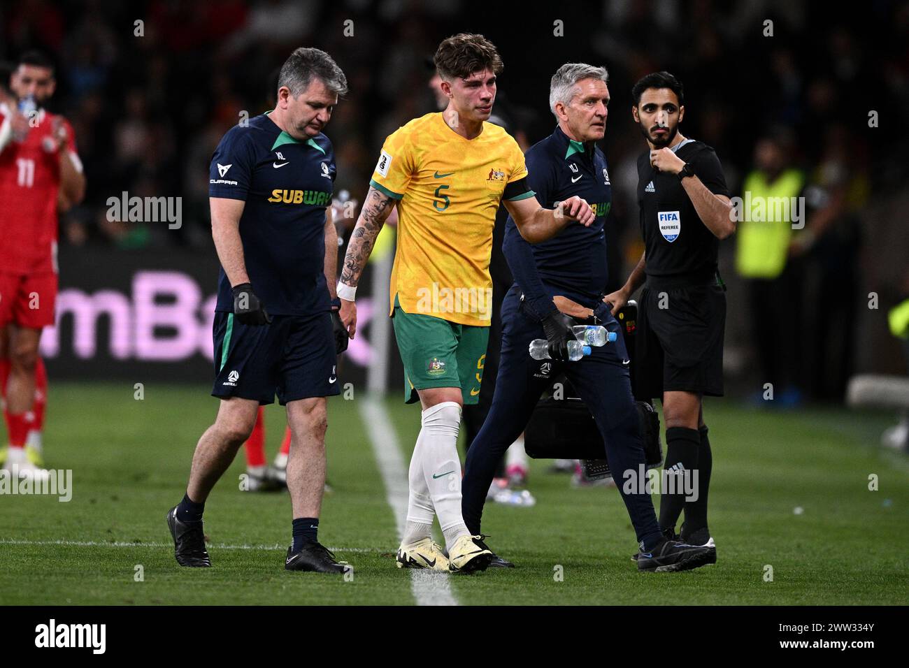 Sydney, Australia. 21st Mar, 2024. Jordy Bos of Australia is assisted ...