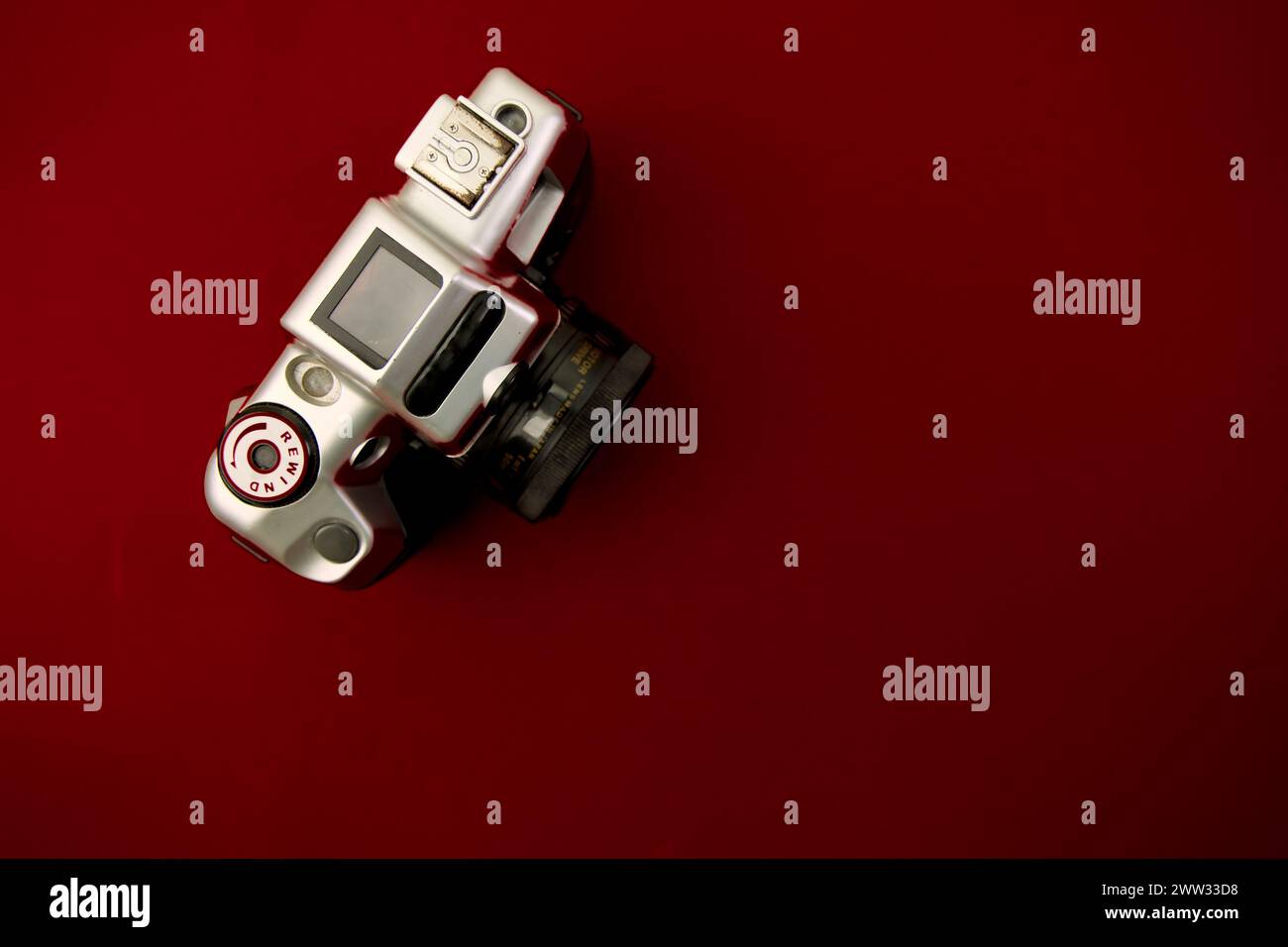 A high-resolution image featuring a vintage camera positioned flat ...