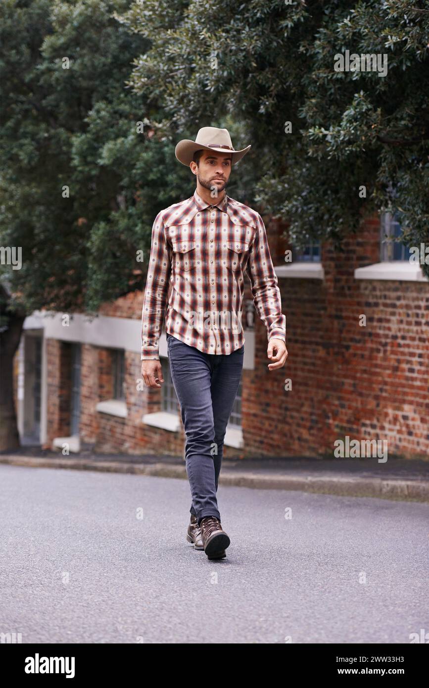 Man, road and outdoor cowboy fashion, western culture and countryside ...