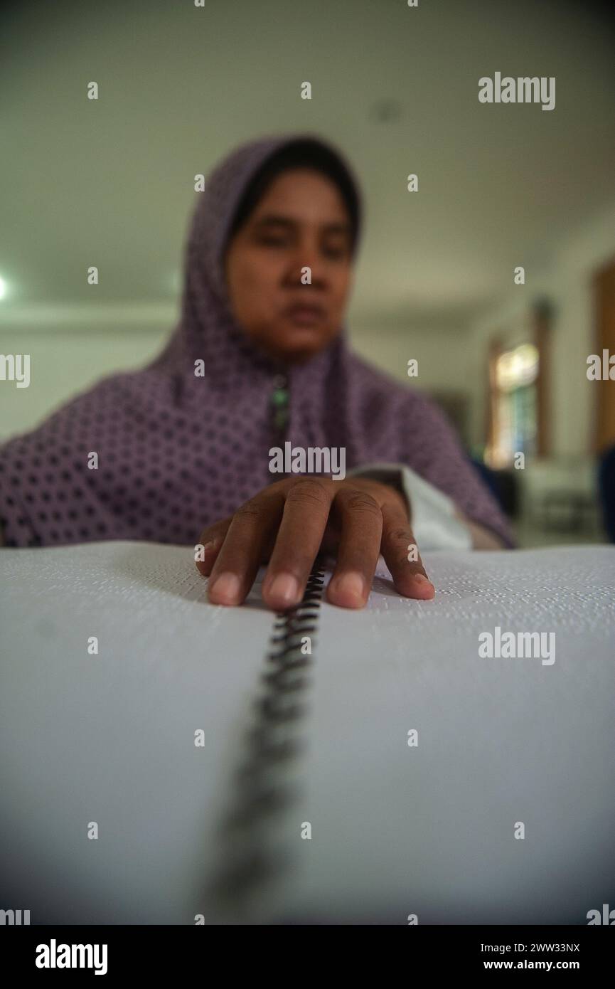Indonesia. 21st Mar, 2024. A visually impaired woman's fingers touched ...