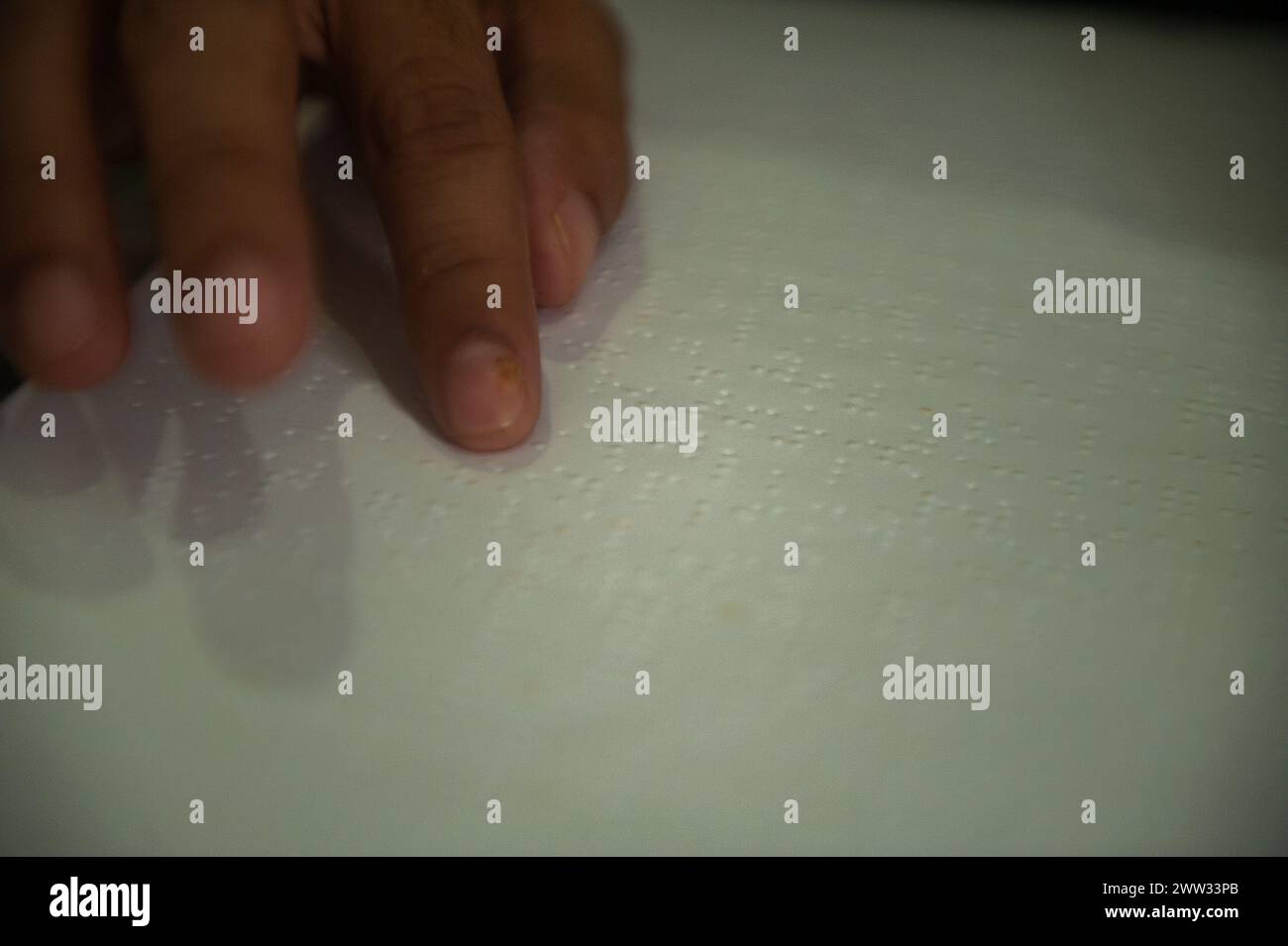 Indonesia. 21st Mar, 2024. A visually impaired man's fingers touched ...