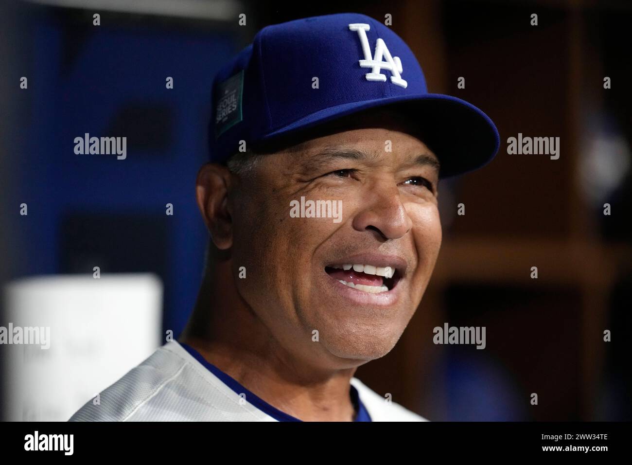 Los Angeles Dodgers manager Dave Roberts stands in the dugout prior to ...
