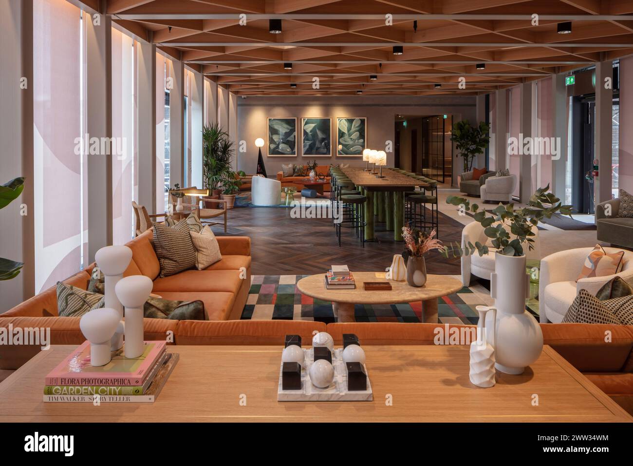 Communal living space with dining table and games. Author, London ...