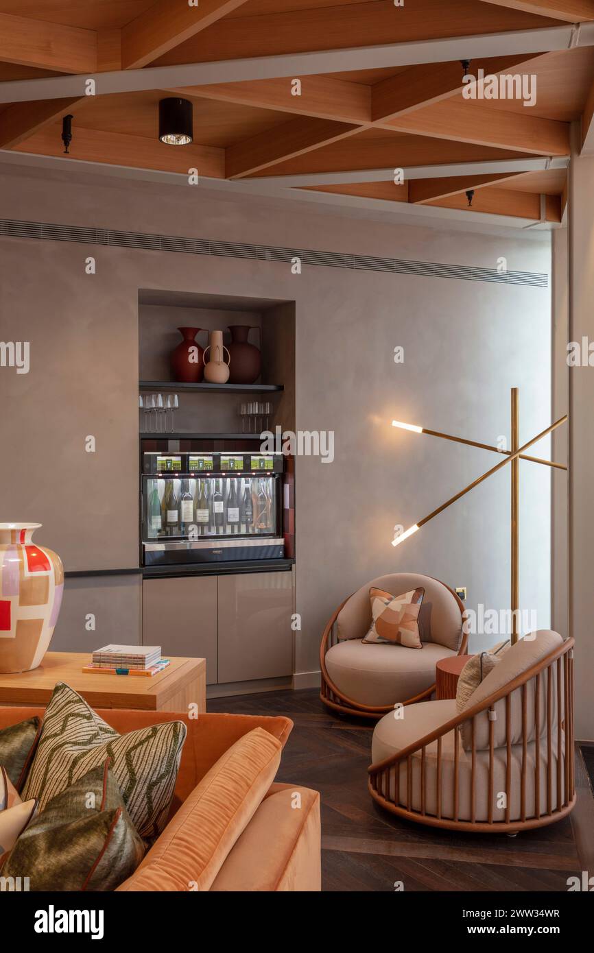 Communal living space with dining table and games and a bar area ...