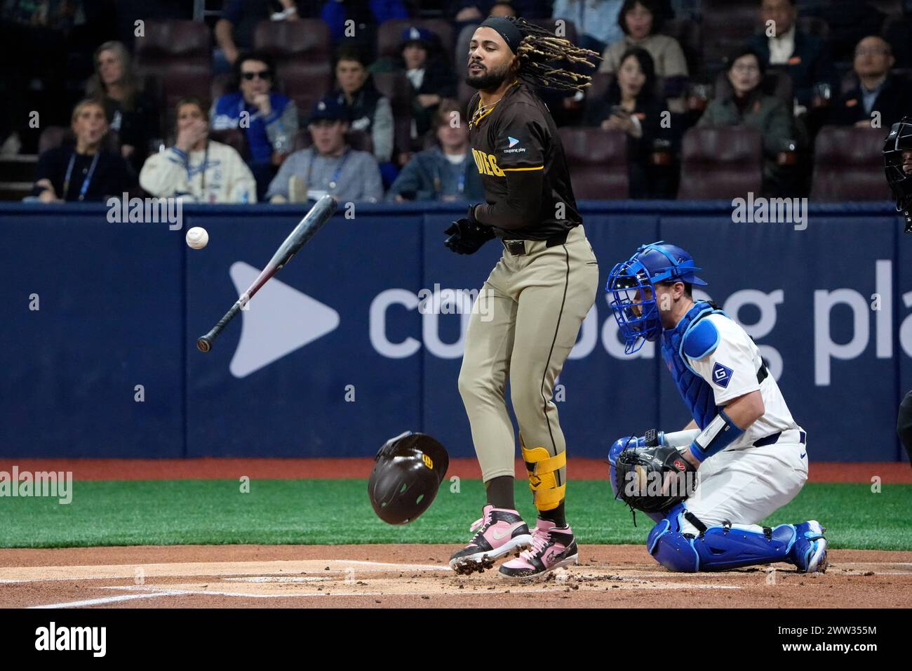 San Diego Padres' Fernando Tatis Jr., left, drops his bat and helmet ...