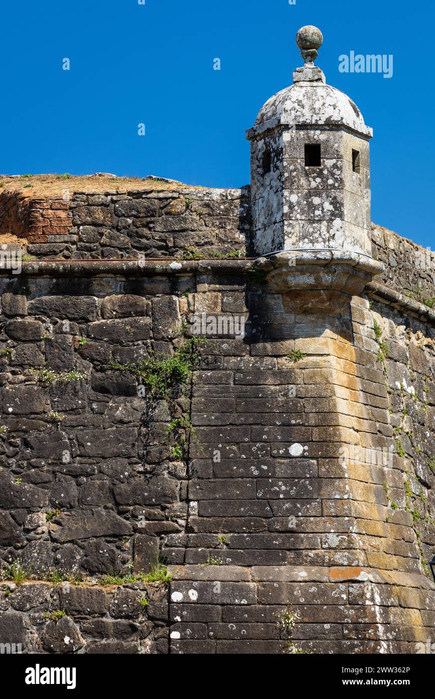 Corner of an old fortress wall with a guard watchtower. Valença ...