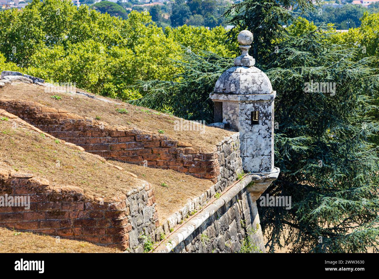 A section of the old Valença Fortress wall with a white guard ...
