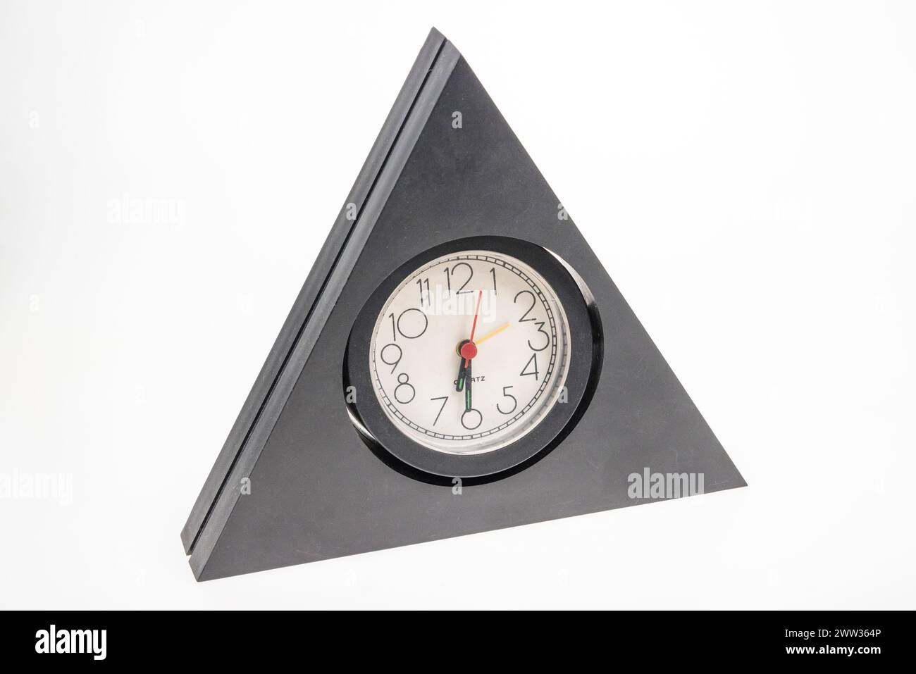 Clock in a triangular mount Stock Photo - Alamy