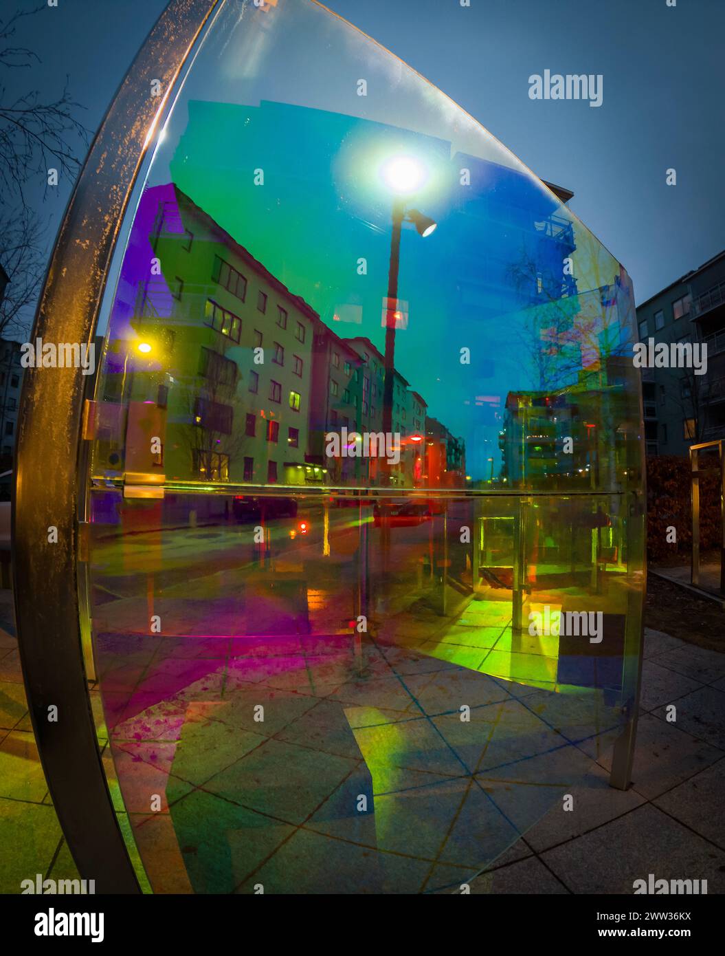 Urban street seen through colorful public glass Stock Photo - Alamy