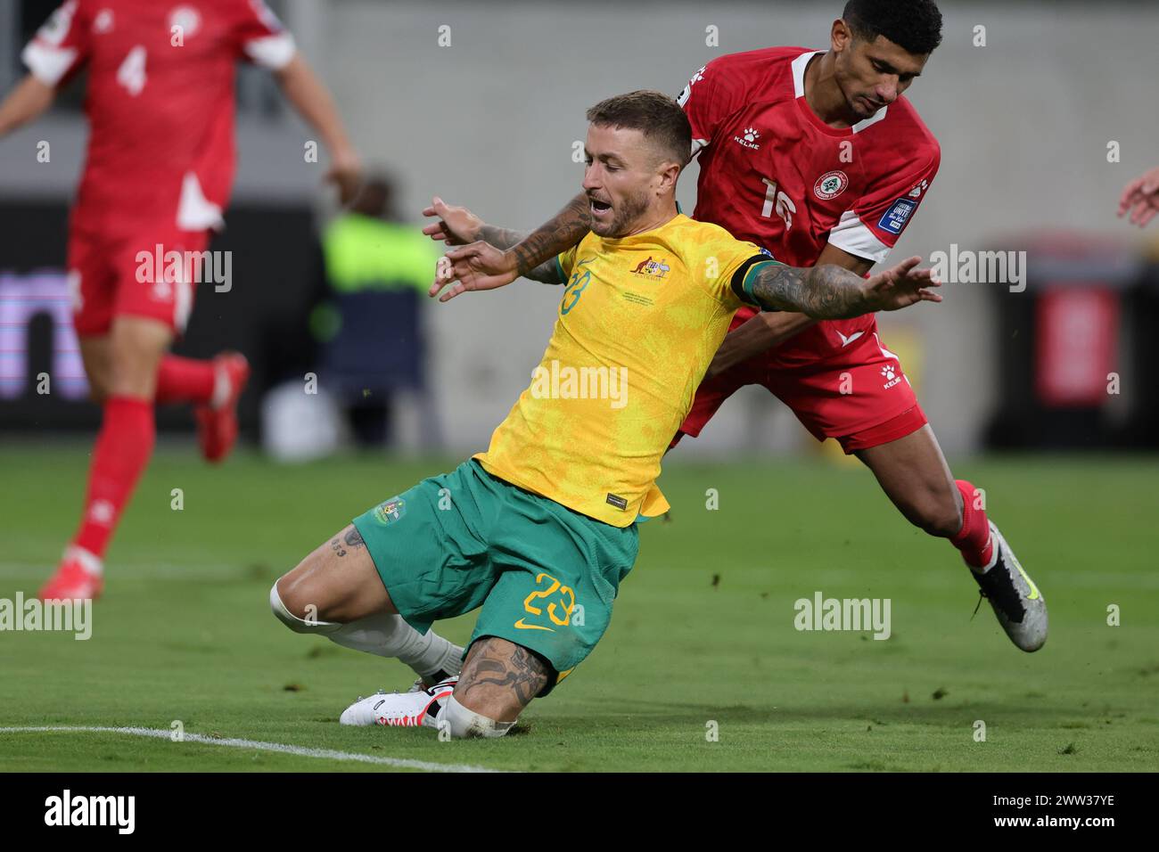 Adam Taggart of Australia attacks on goal but Walid Shour of Lebanon ...