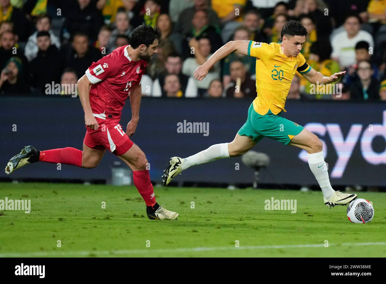 Lebanon's Khalil Khamis, left, chases Australia's John Iredale during ...