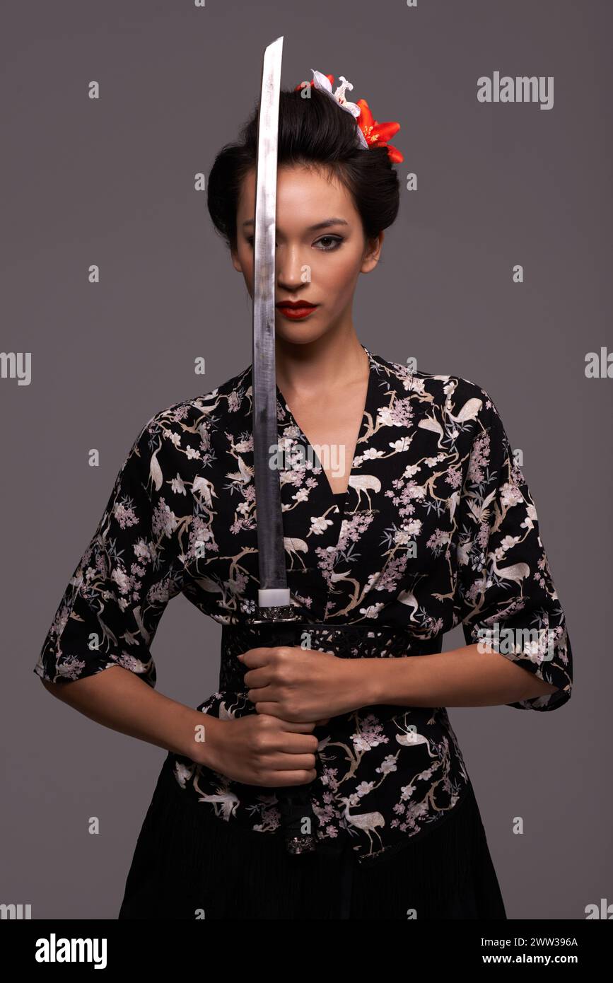 Asian lady sword in studio hi-res stock photography and images - Alamy
