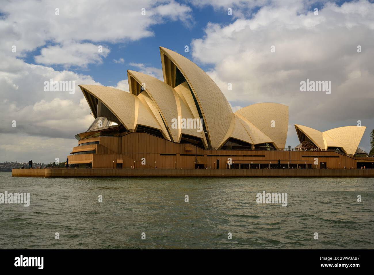 Side view of the Sydney Opera House on a sunny day, Sydney Harbour ...