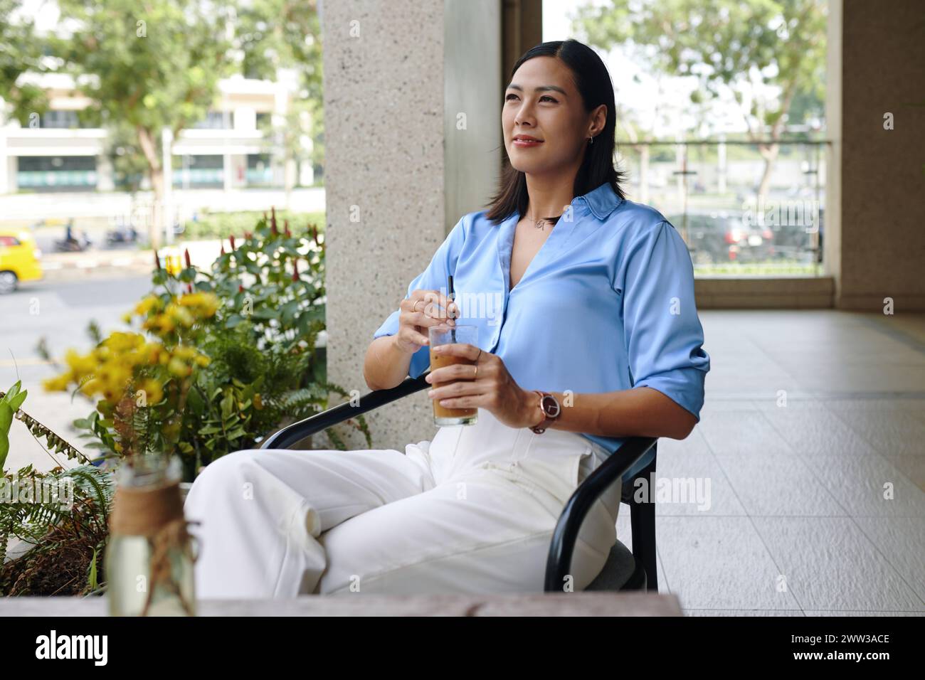 Woman relaxed drinking iced coffee hi-res stock photography and images ...