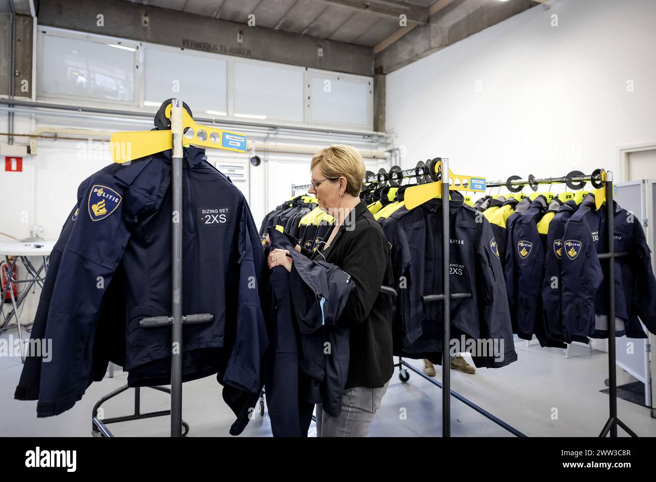 OSSENDRECHT - The new uniform is ready to be tried on on clothing racks ...
