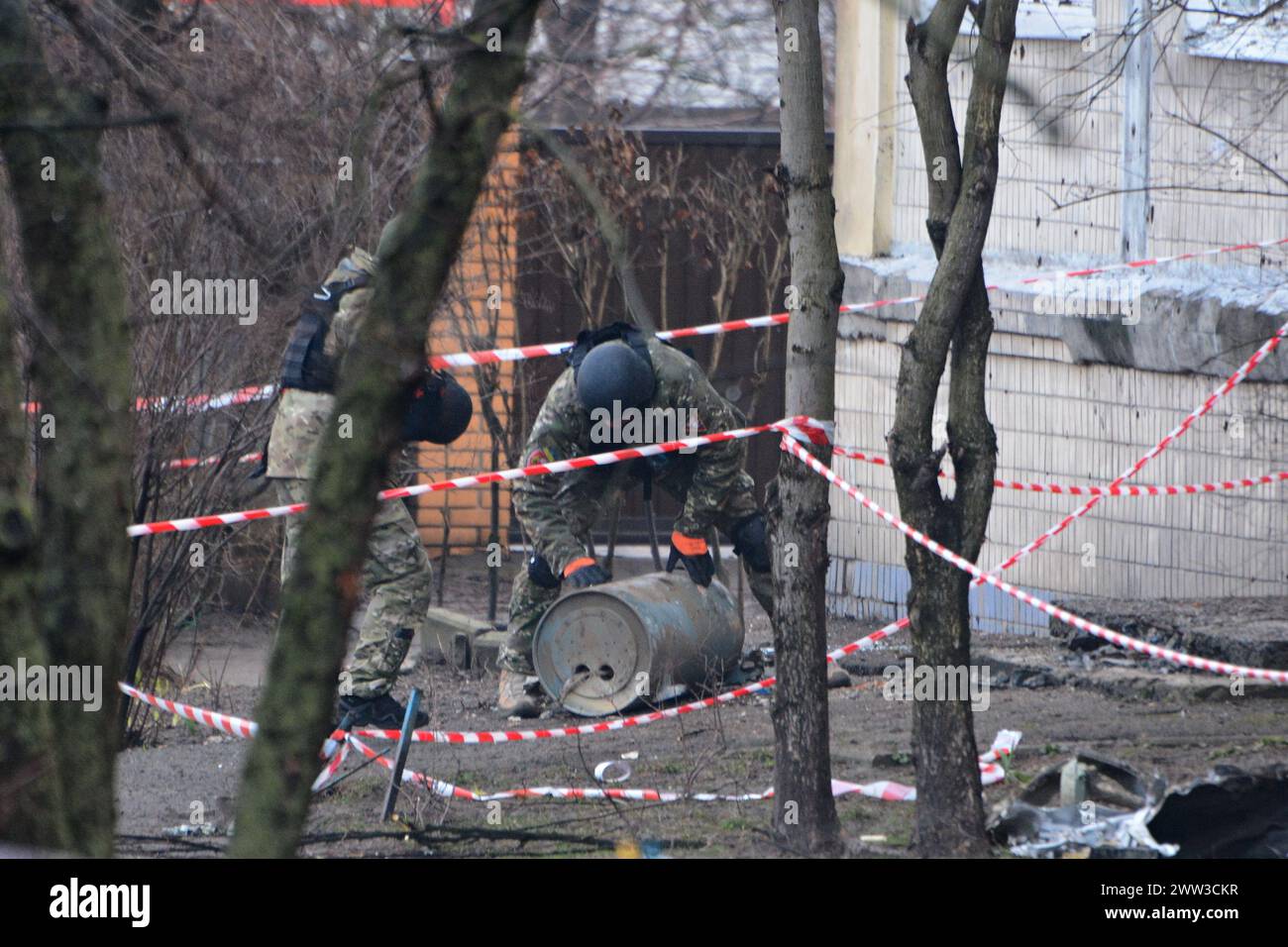 Kyiv, Ukraine. 21st Mar, 2024. Ukrainian explosives technicians load a ...