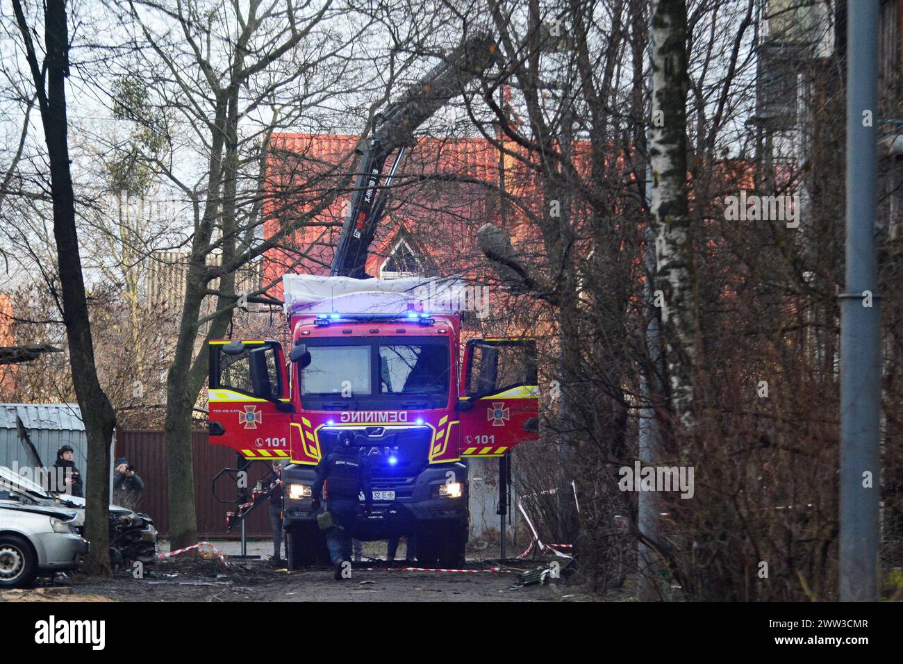 Kyiv, Ukraine. 21st Mar, 2024. Ukrainian explosives technicians load a ...