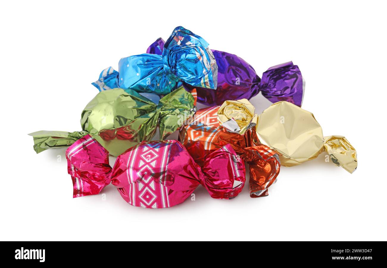 Sweet candies in colorful wrappers on white background Stock Photo - Alamy