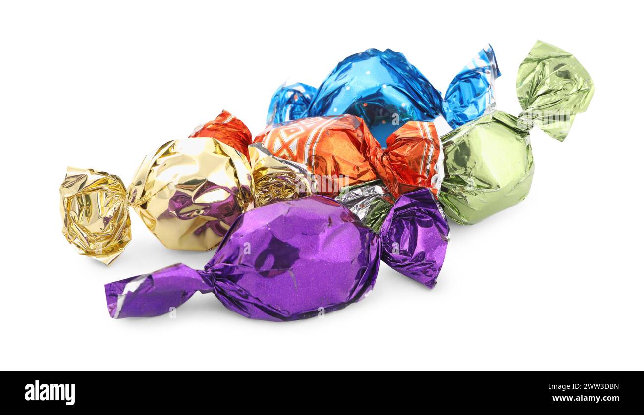 Sweet candies in colorful wrappers on white background Stock Photo - Alamy