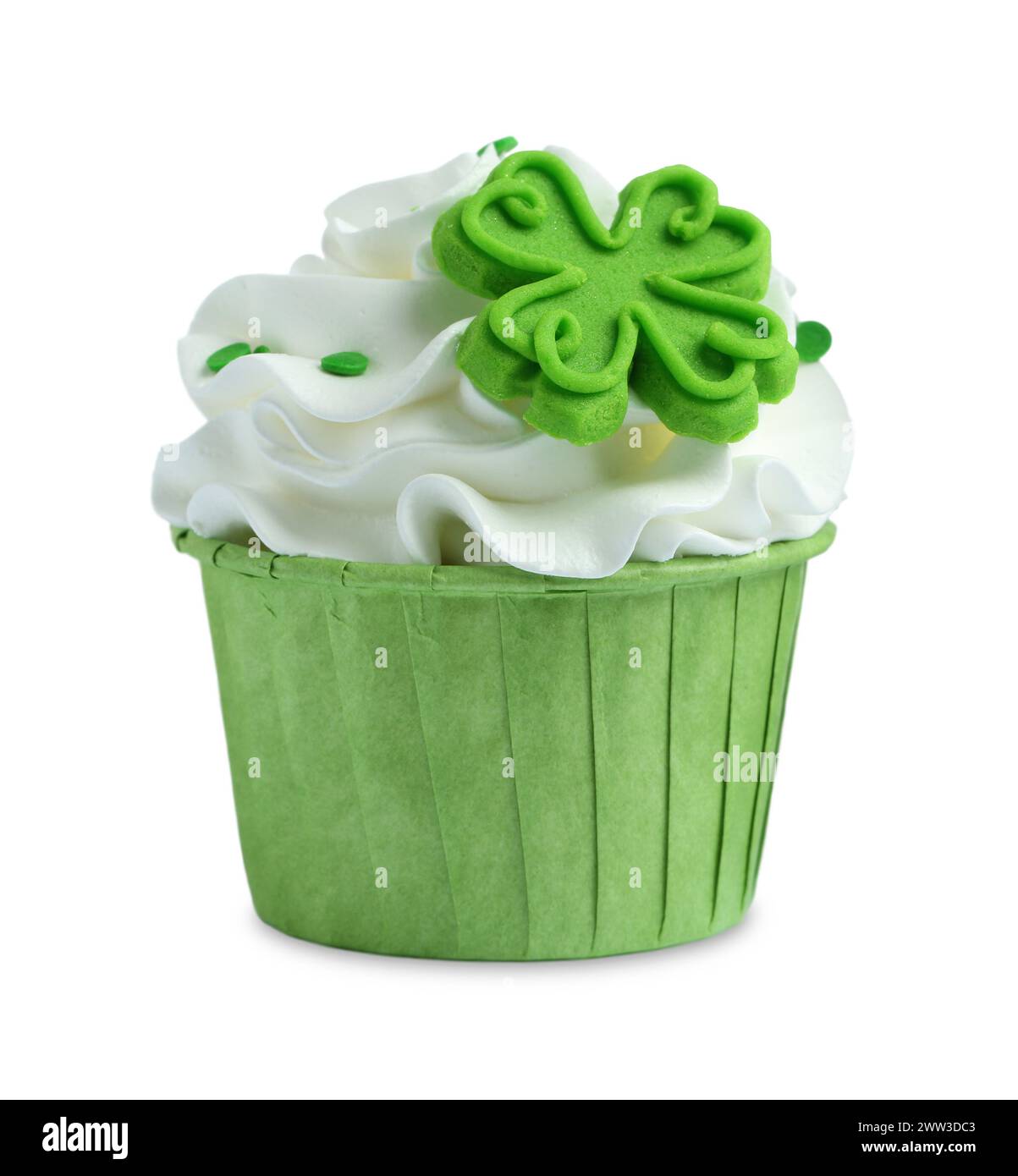 St. Patrick's day party. Tasty cupcake with green clover leaf topper ...