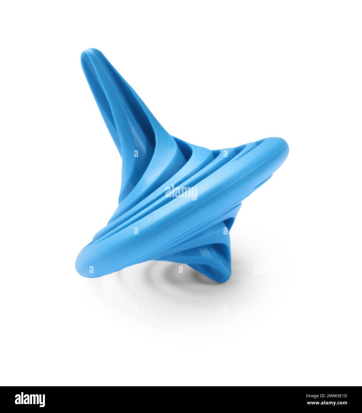One blue spinning top isolated on white Stock Photo - Alamy