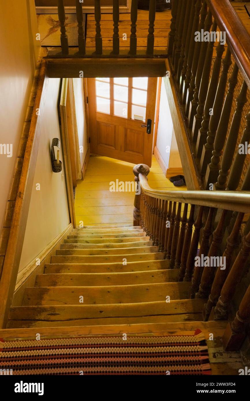 Railings on upstairs floor hallway and staircase leading to downstairs ...