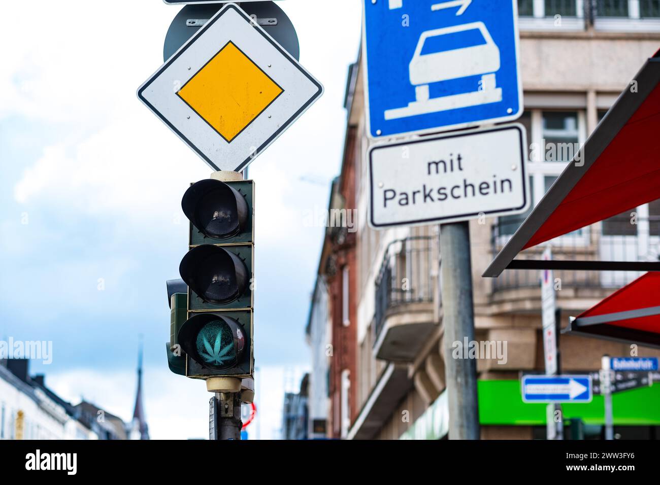 Traffic lights with cannabis leaf and right of way sign in Aachen ...