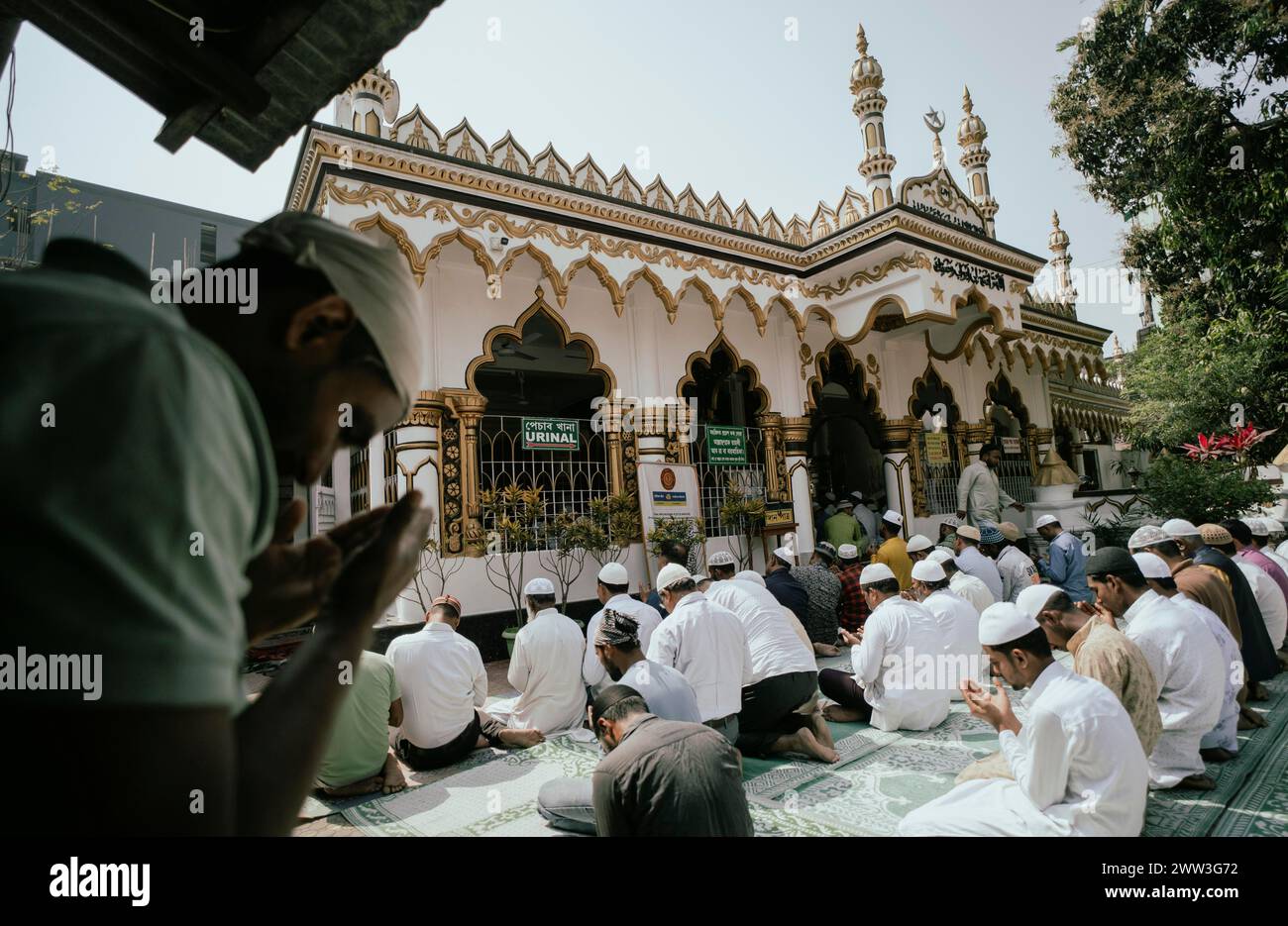 Muslim devotees offer the first Friday prayers of the holy month of ...