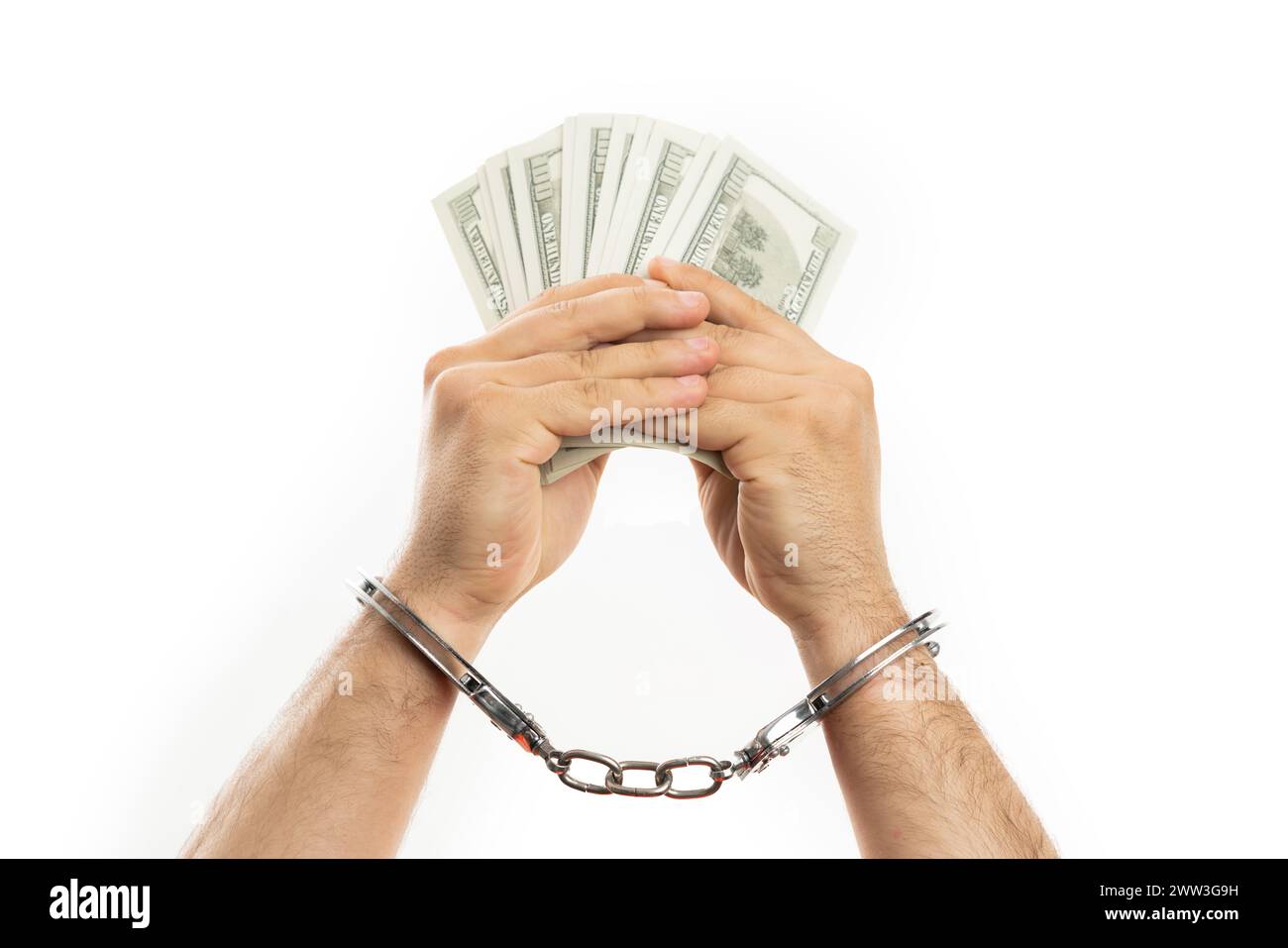 Close-up of corrupted adult man in handcuffs showing stolen cash money ...