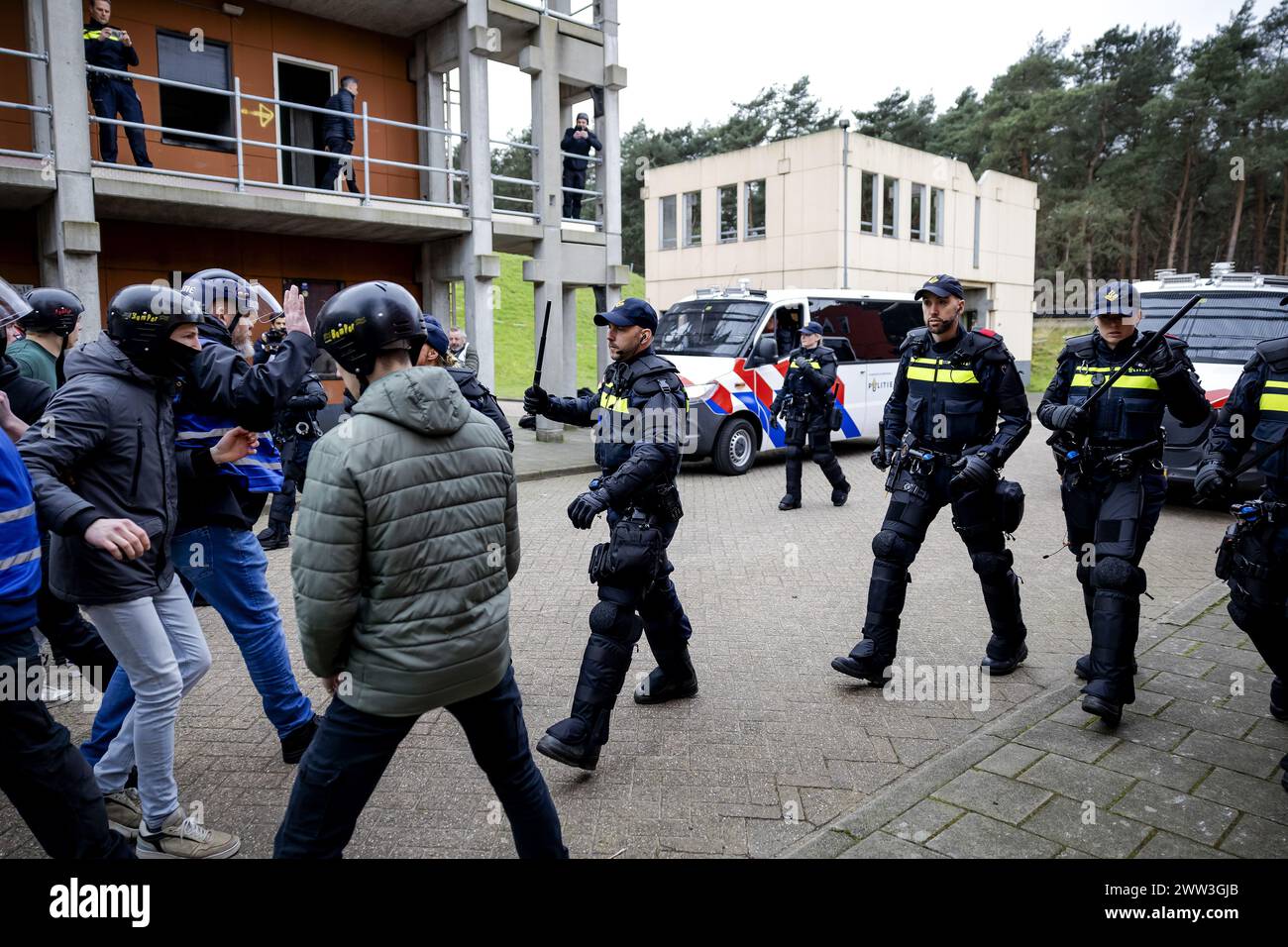 OSSENDRECHT - Police officers in action during a demonstration by the ...