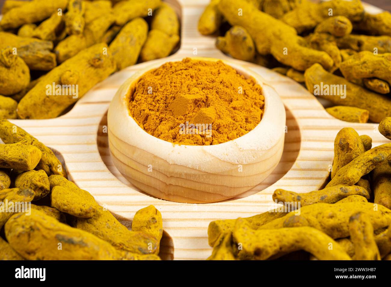 Turmeric powder and dried turmeric root top view Stock Photo - Alamy