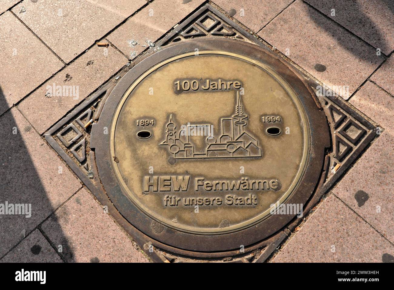 Commemorative plaque on the pavement celebrates 100 years of district ...