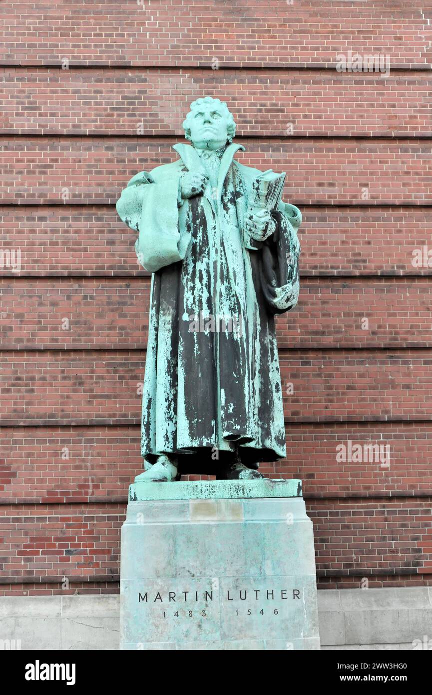 Bronze statue of Martin Luther in front of red brick wall, Hamburg ...