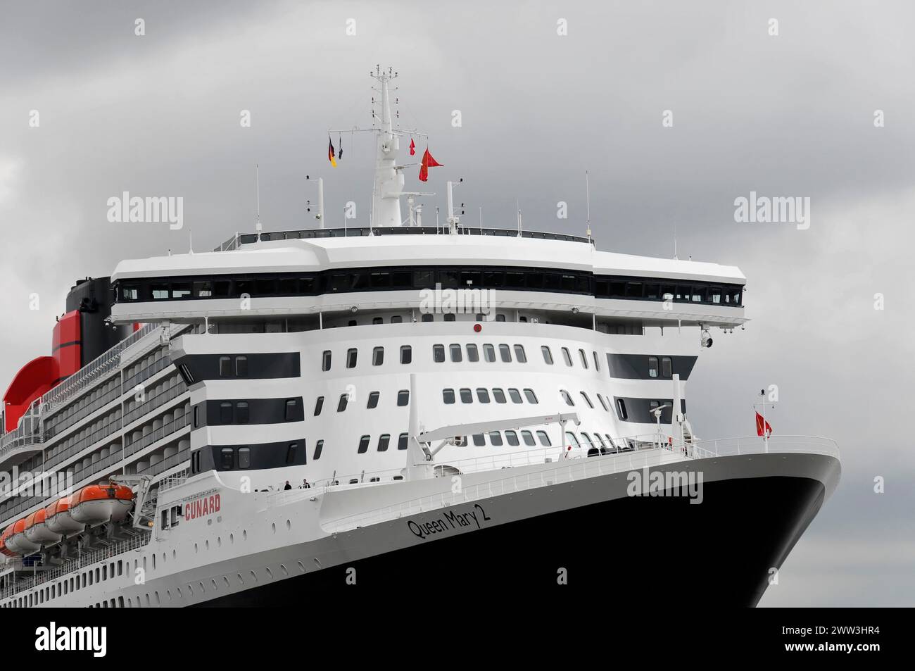Close-up of the upper decks of a cruise ship Queen Mary 2, with red ...