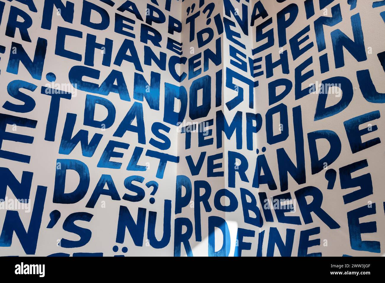 Decorative wall with letters and words, event space Basecamp ...